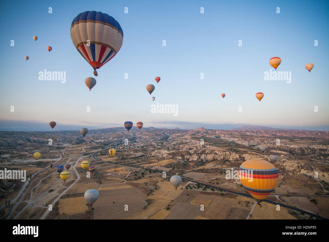 Color image of hot air balloons flying in Cappadocia, Turkey, at ...