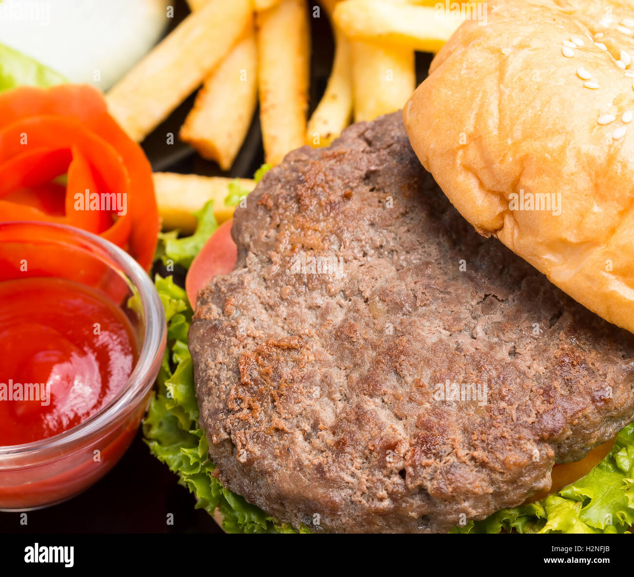 Roll And Burger Showing Junk Food And Chips Stock Photo - Alamy