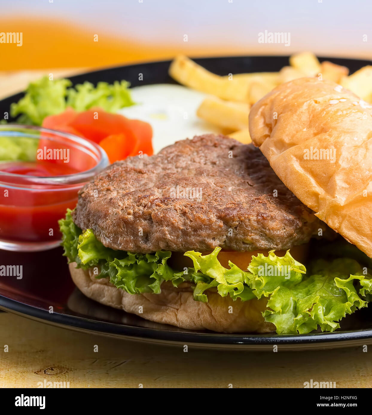 Burger In Roll Showing Ready To Eat And Ready To Eat Stock Photo - Alamy