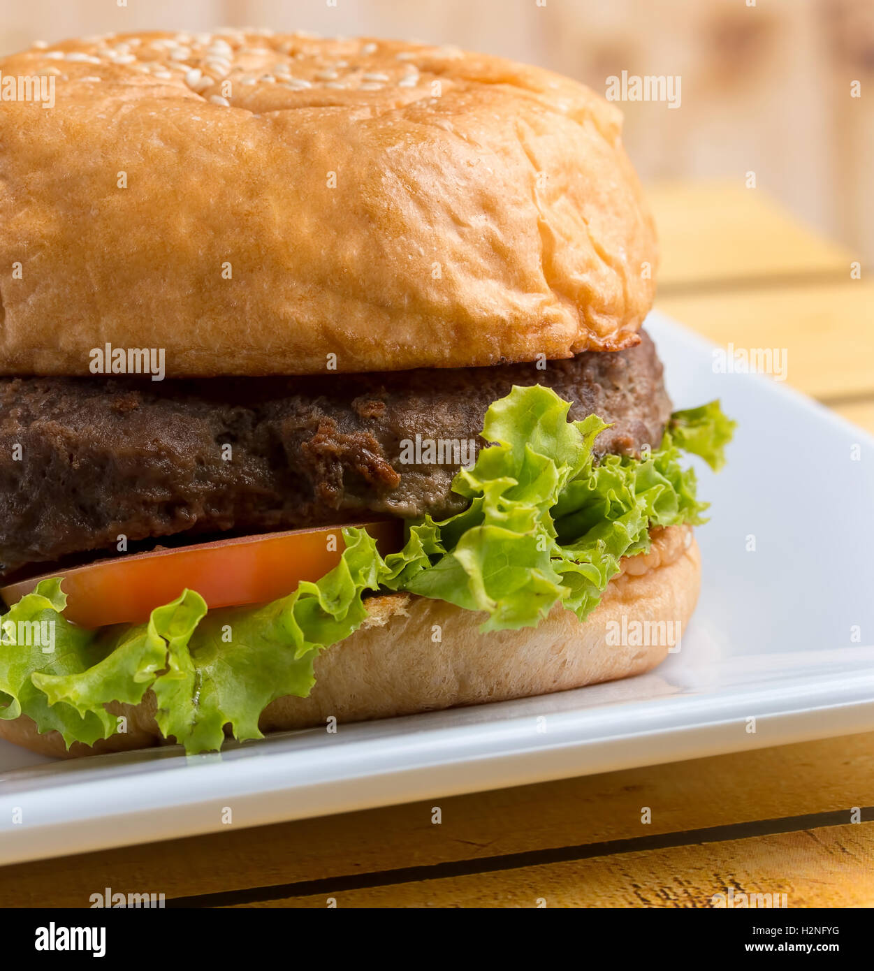 Burger In Roll Showing Ready To Eat And Ready To Eat Stock Photo - Alamy
