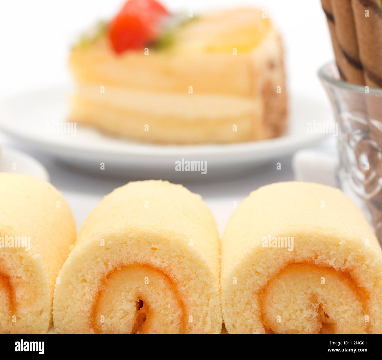 Swiss Rolls Meaning Delicious Cake And Gateau Stock Photo - Alamy