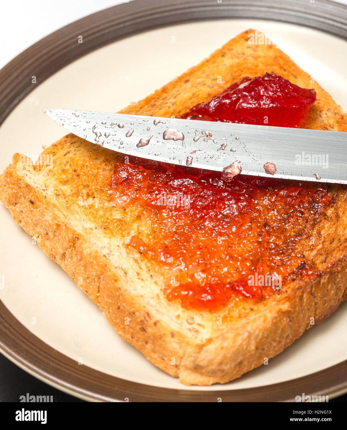 Jam On Toast Indicating Fruit Preserves And Sweet Stock Photo - Alamy