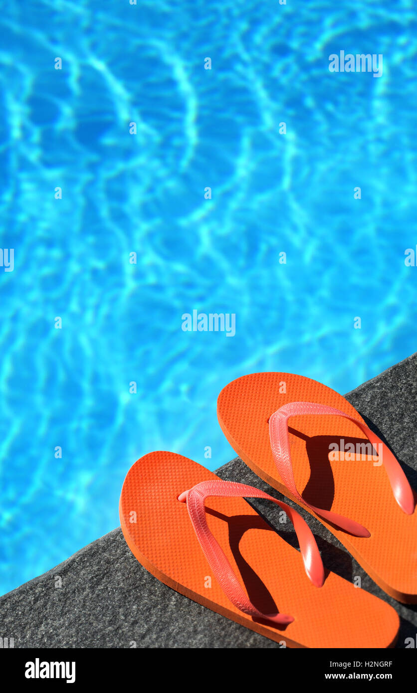 sandals by a pool Stock Photo - Alamy