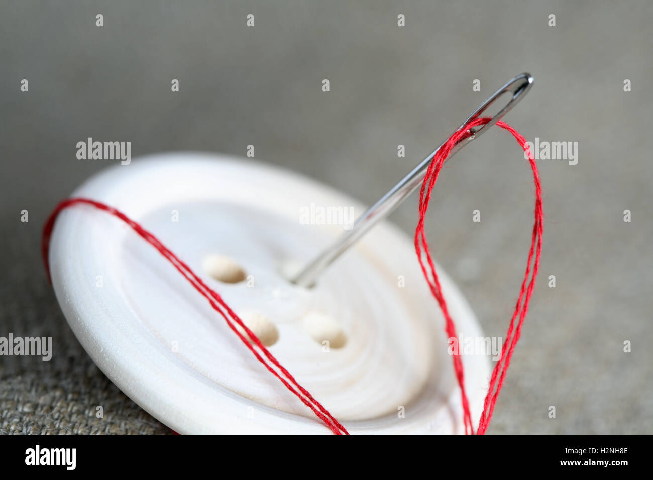 Button sewing item hi-res stock photography and images - Alamy