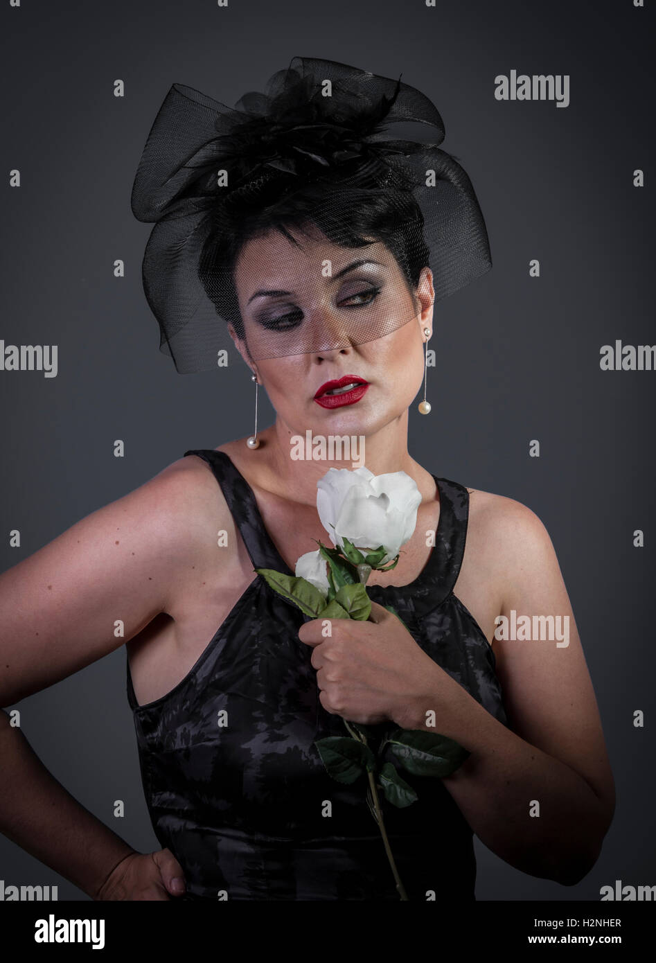 sadness.Widow At Funeral. Beautiful retro woman Stock Photo - Alamy