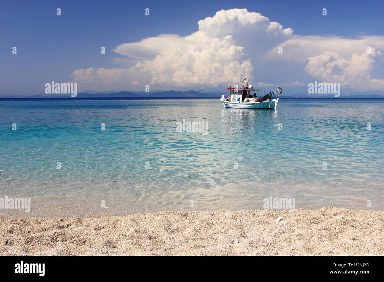 Fishing boat in the Ionian sea in Lefkada Greece Stock Photo - Alamy