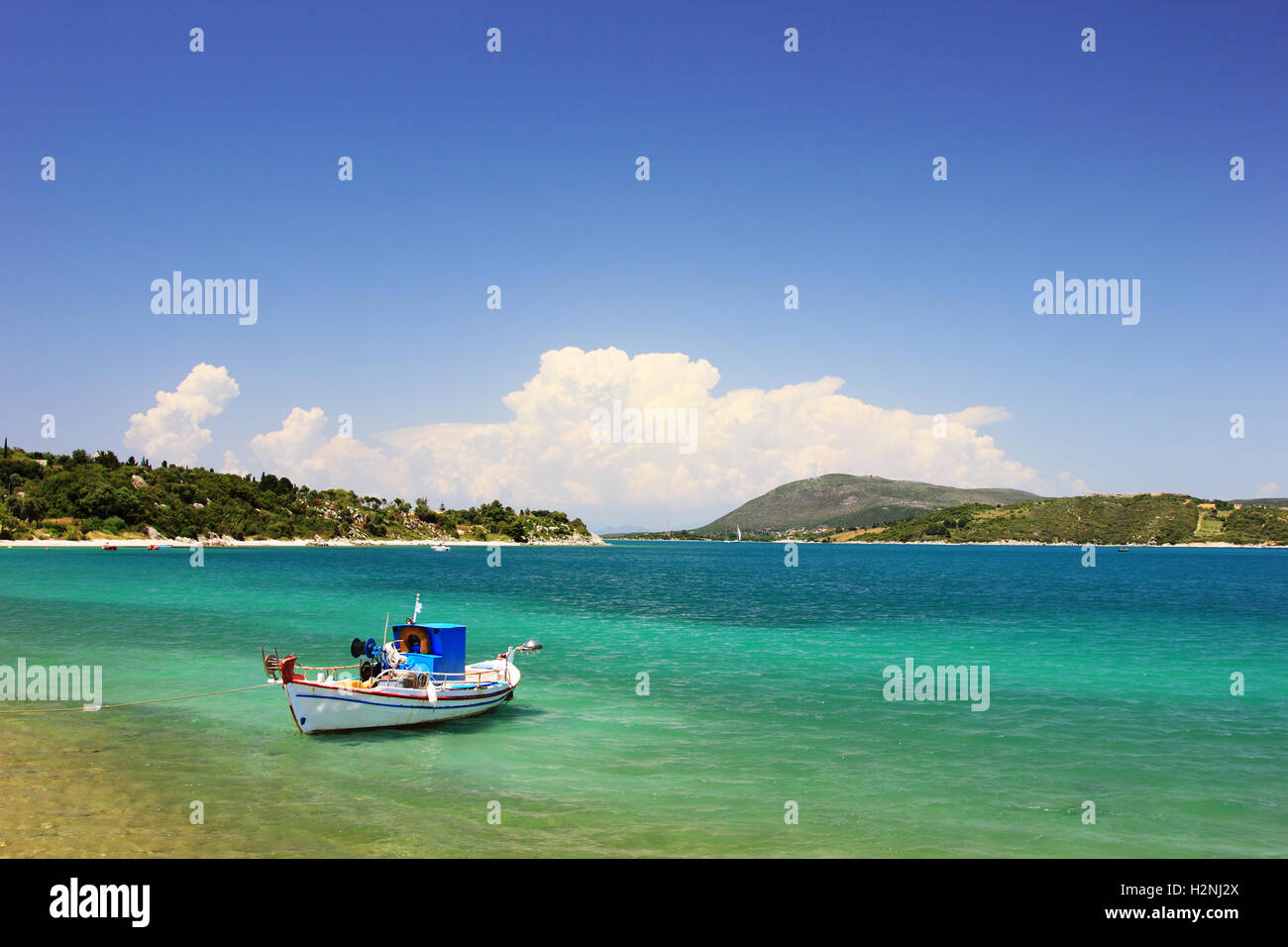 Fishing boat in the Ionian sea in Lefkada Greece Stock Photo - Alamy