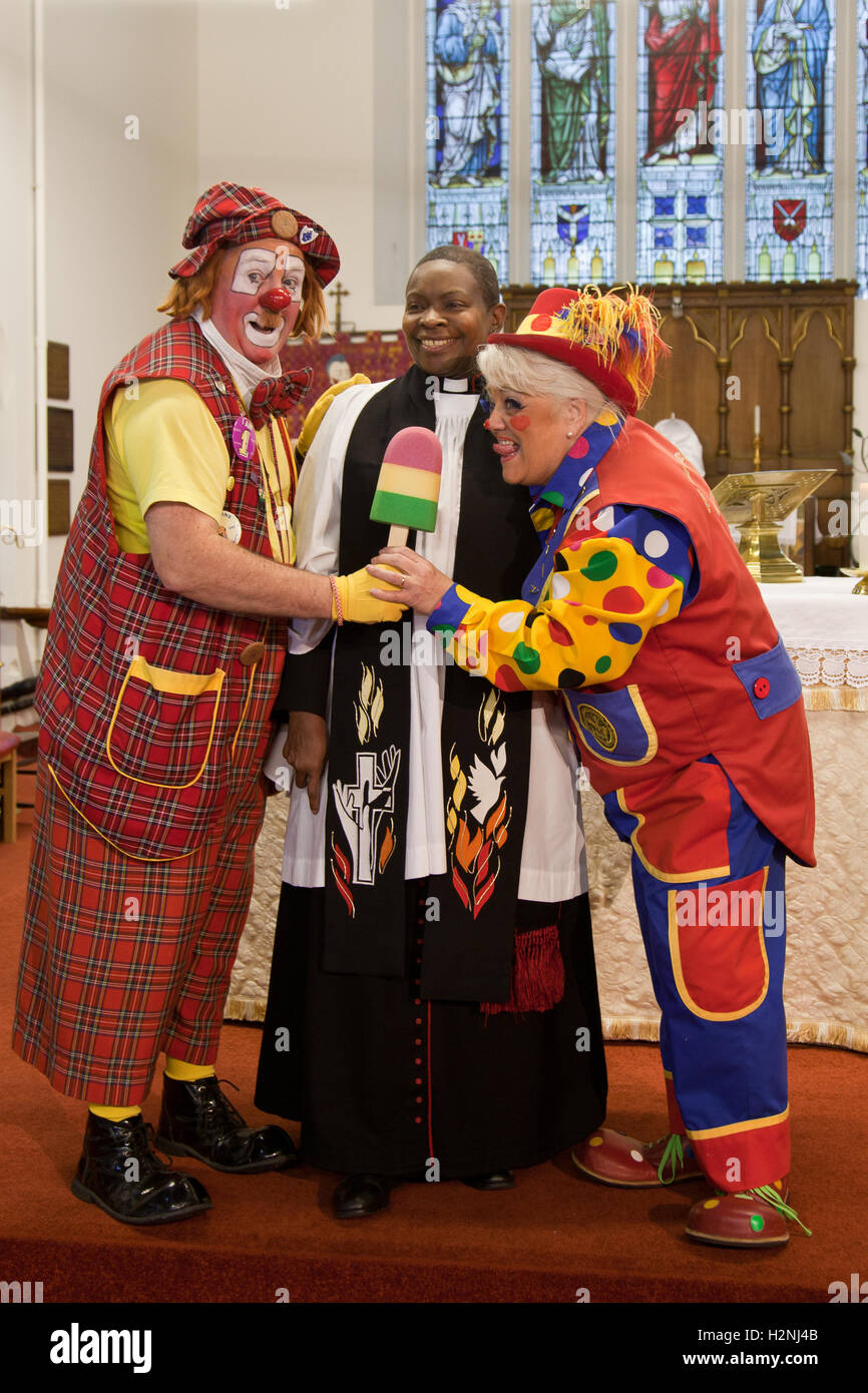 Priest And Clown High Resolution Stock Photography and Images - Alamy