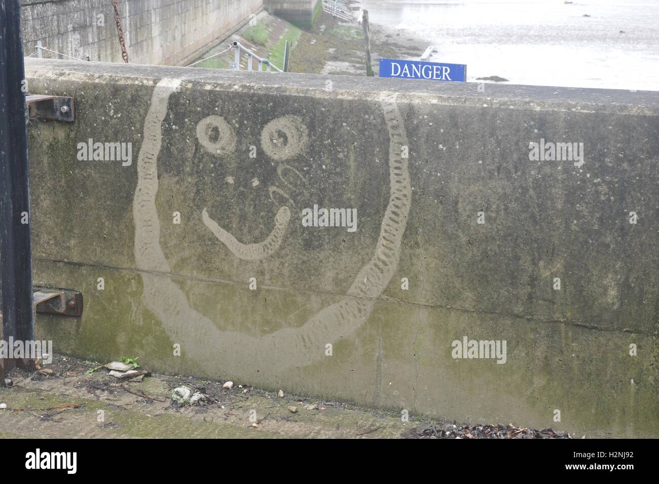 Laughing in the face of danger Stock Photo - Alamy