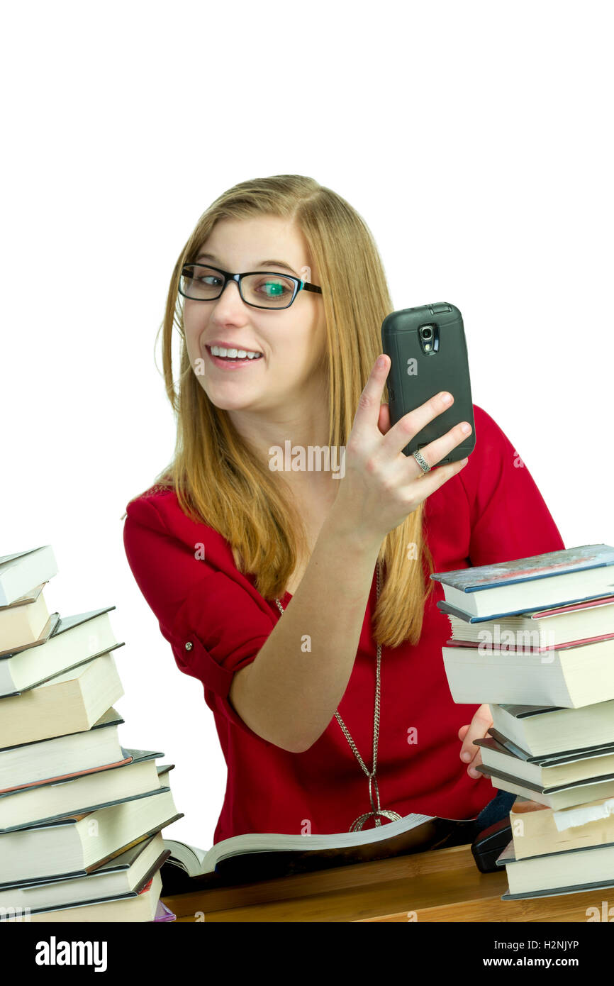 Student using cellphone instead of studying Stock Photo - Alamy Student using cellphone instead of studying Stock Photo - Alamy