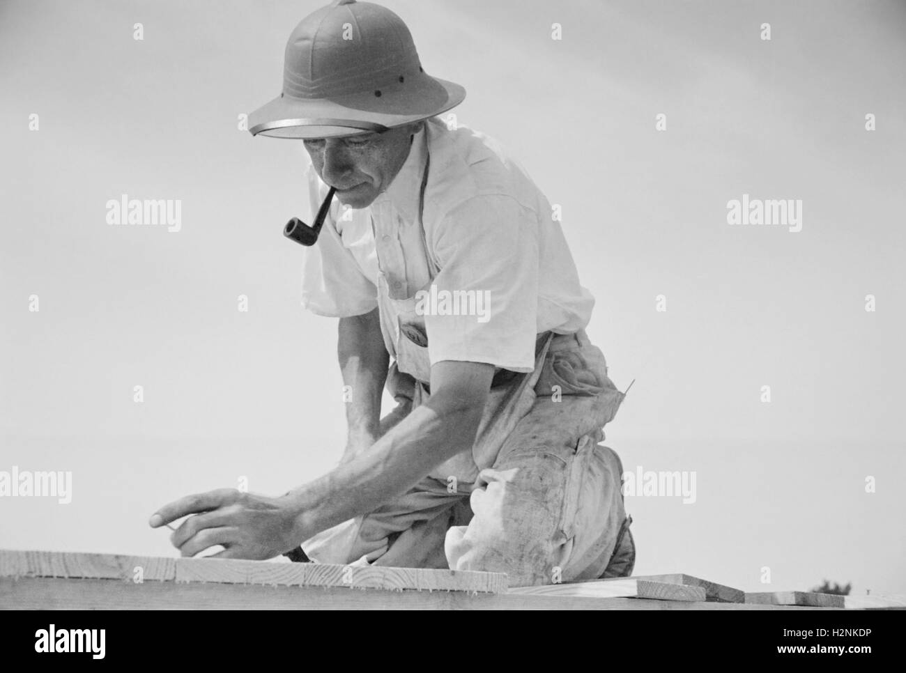 Carpenter Working in Model Community Planned by Suburban Division of U ...