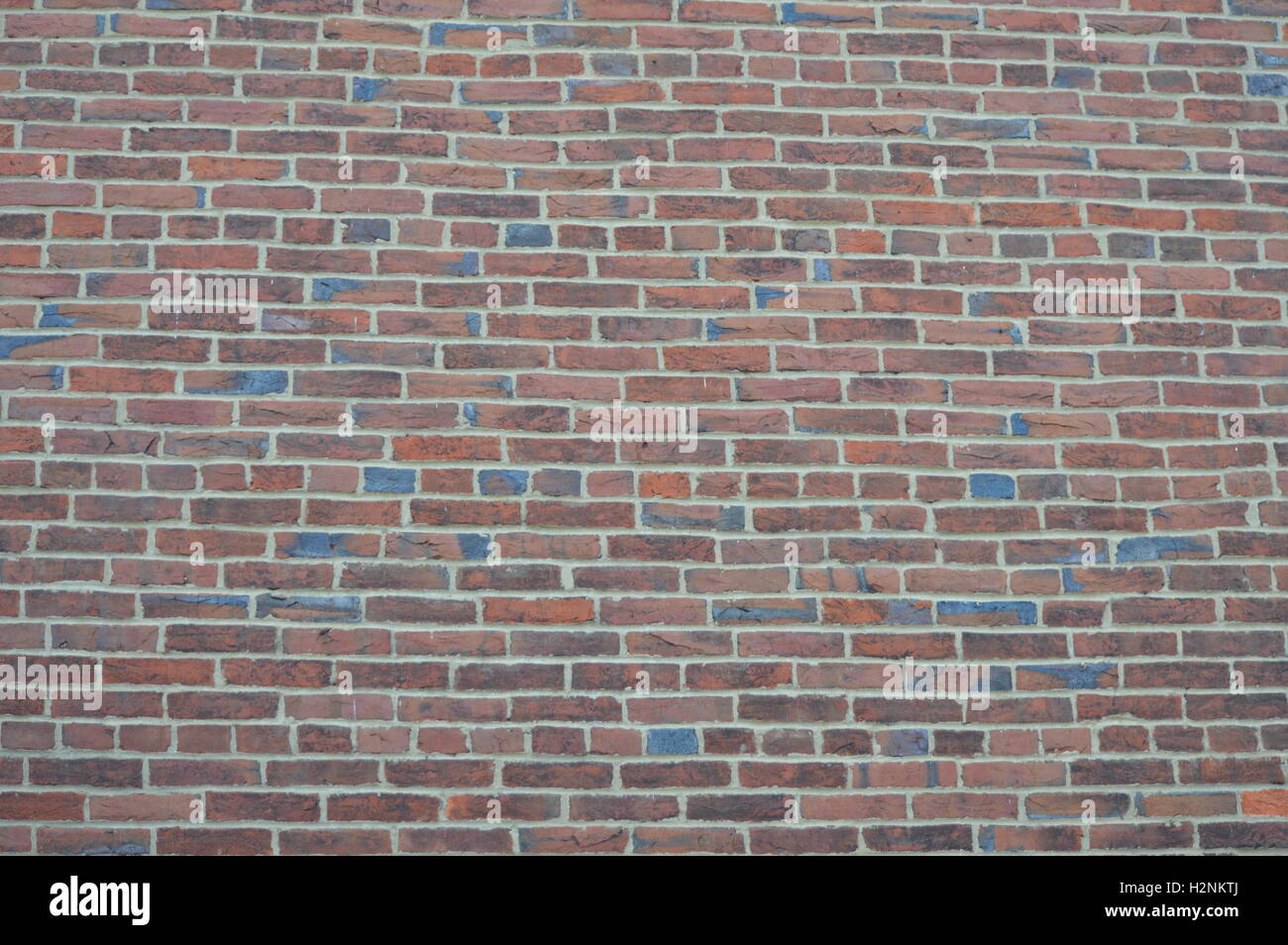 Antique brick and stone wall forms an interesting pattern Stock Photo ...
