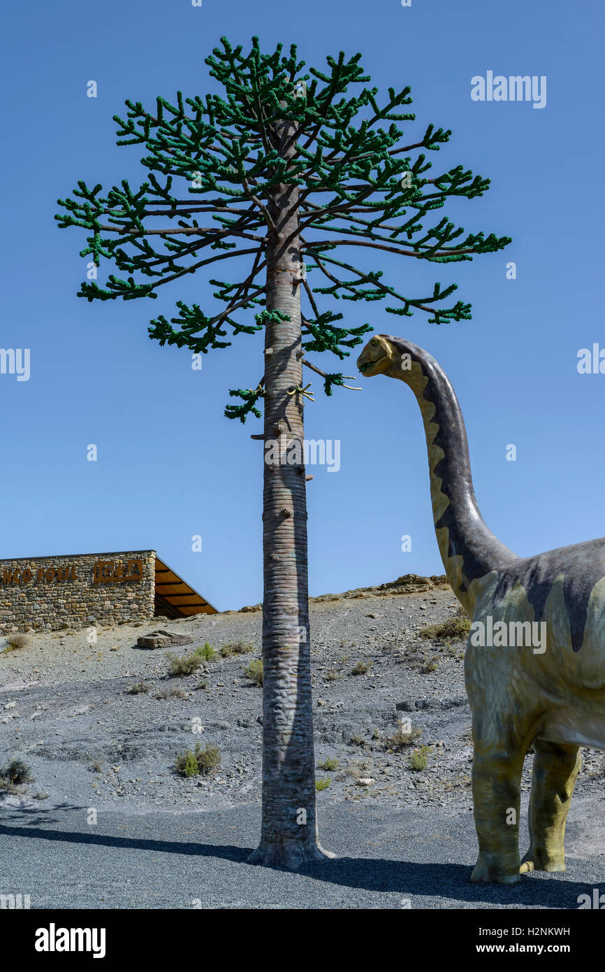 Statue of a sauropod eating the branches of Araucaria in the village of ...
