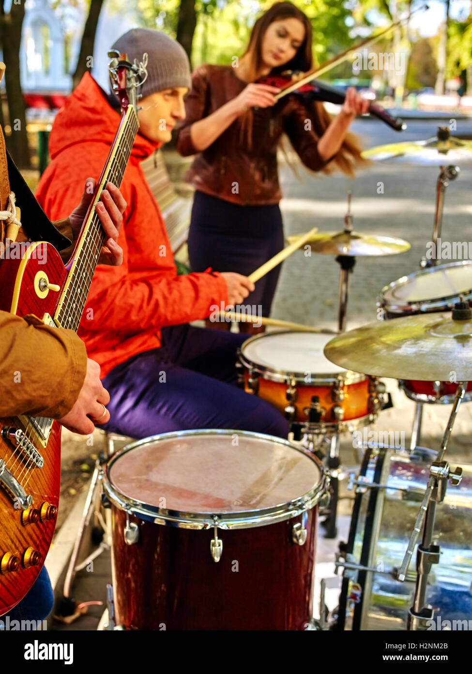 Music street performers with girl violinist Stock Photo - Alamy