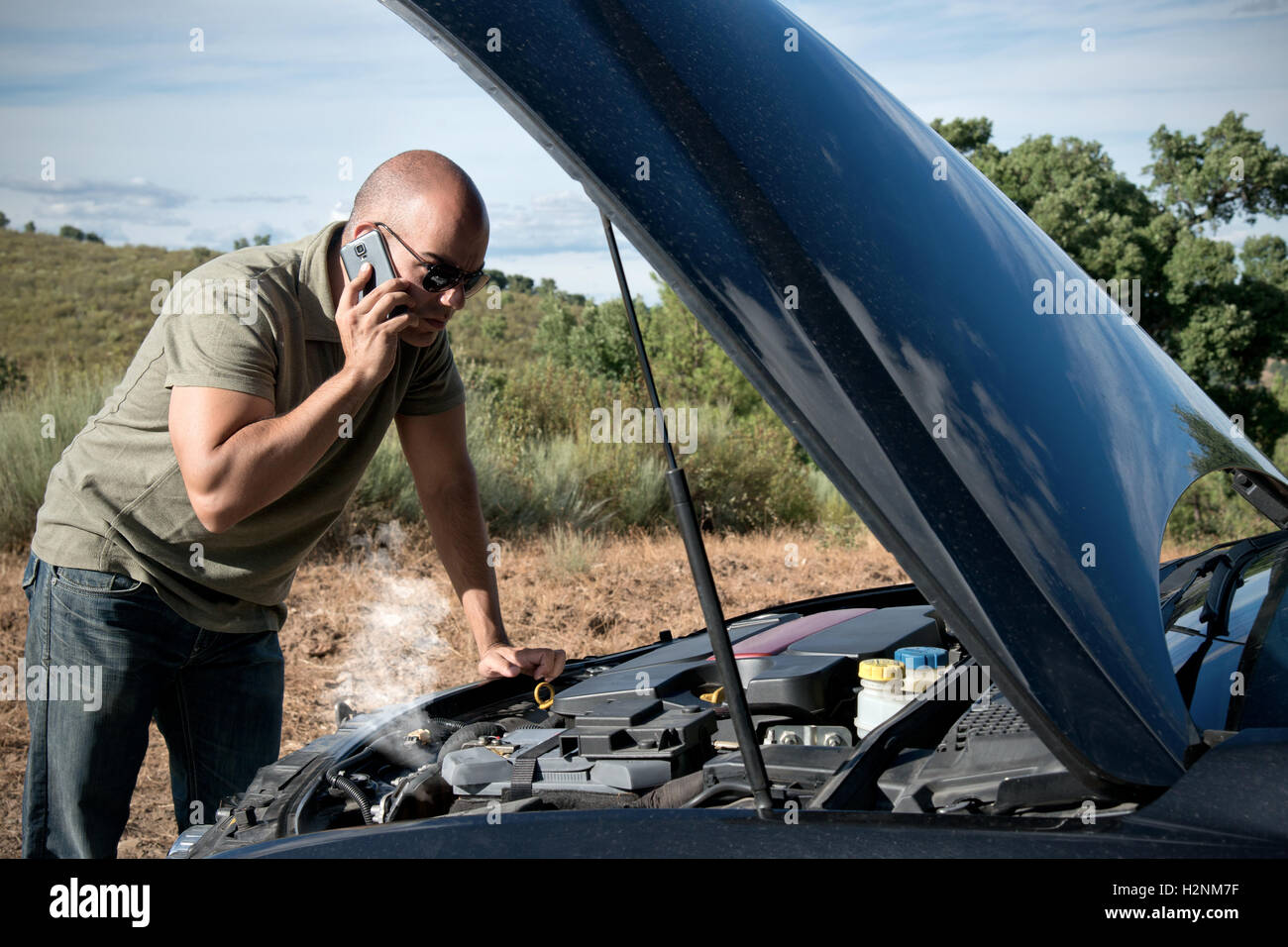 Fire engine emergency phone High Resolution Stock Photography and ...