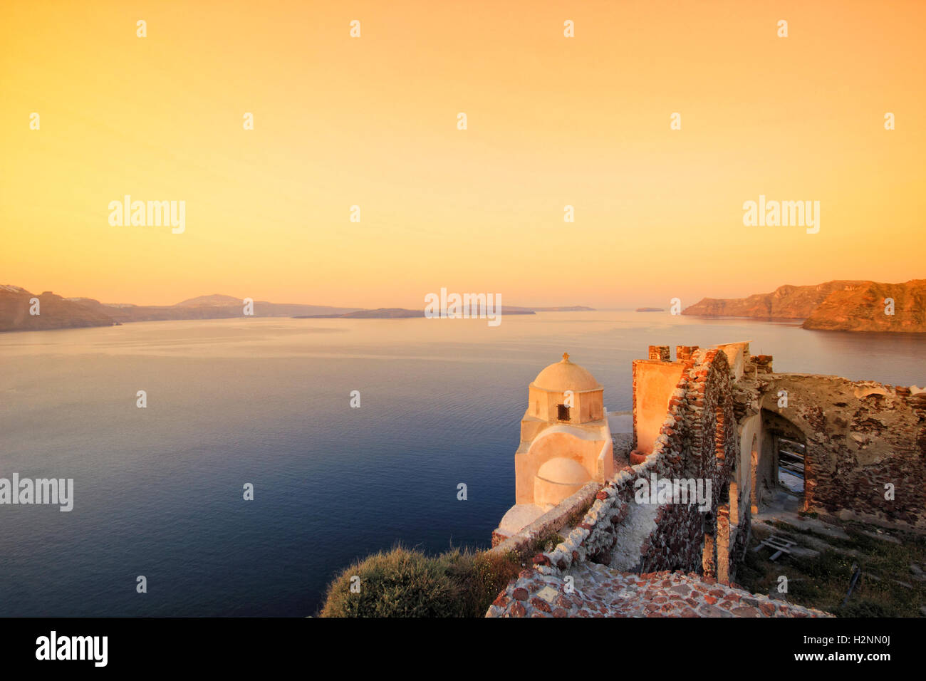 Oia castle at sunrise - Santorini island Greece Stock Photo - Alamy