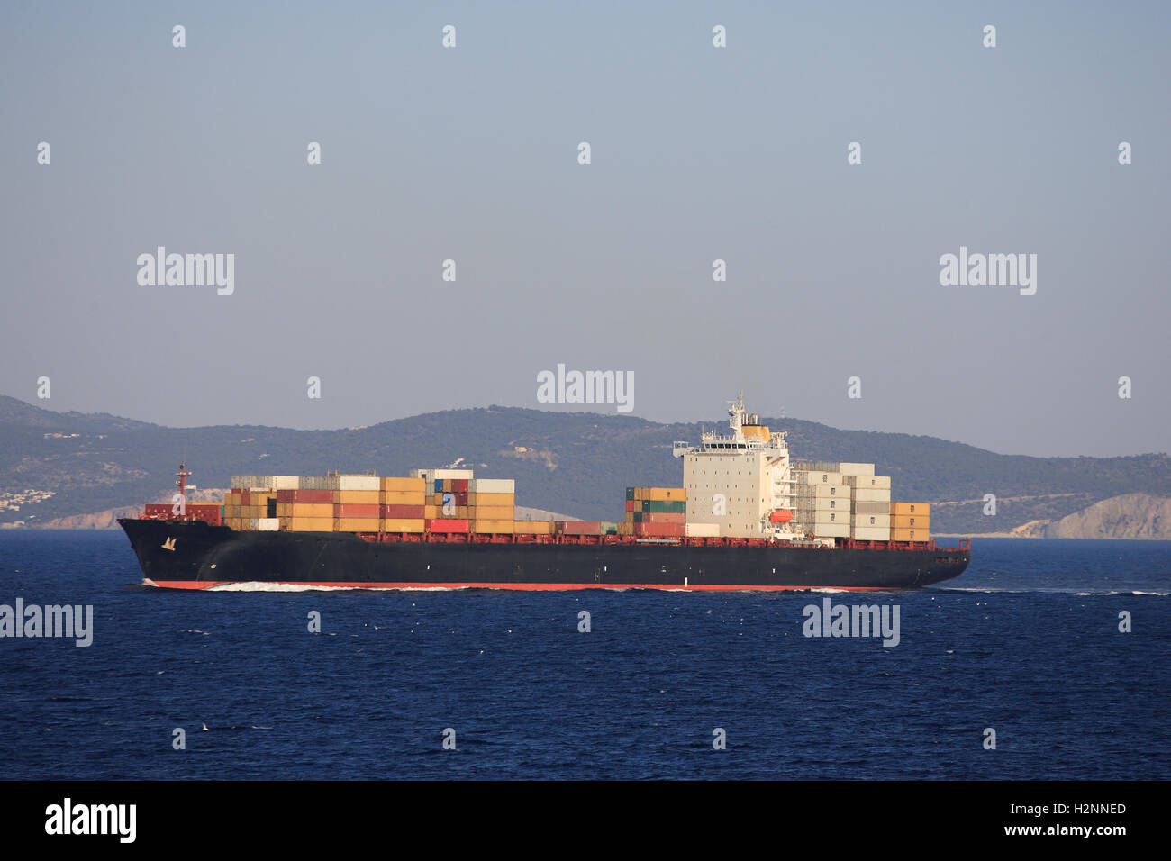 Cargo ship in the Aegean sea in Greece Stock Photo - Alamy