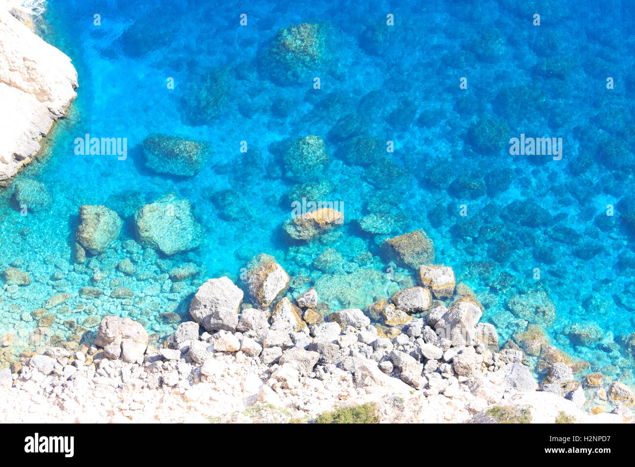 Beautiful Deep blue sea and rocks in Greece Stock Photo - Alamy