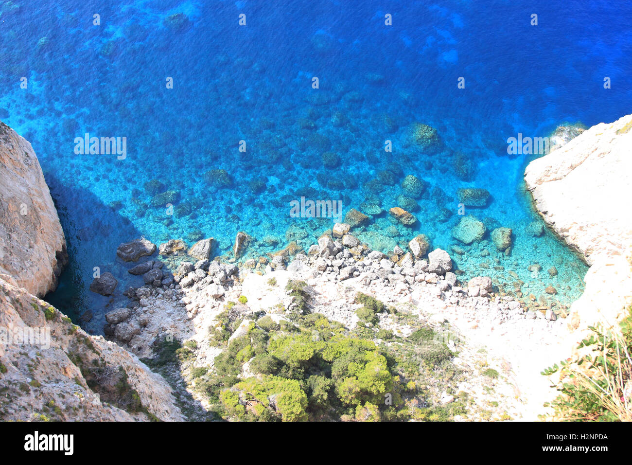 Beautiful Deep blue sea and rocks in Greece Stock Photo - Alamy
