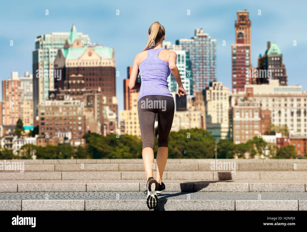 Rear view of female runner hi-res stock photography and images - Alamy