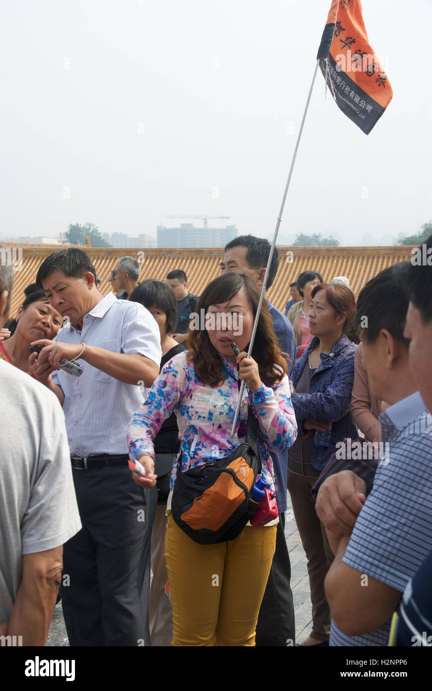 A Chinese tour guide at Beijing's Forbidden City calls the Chinese ...