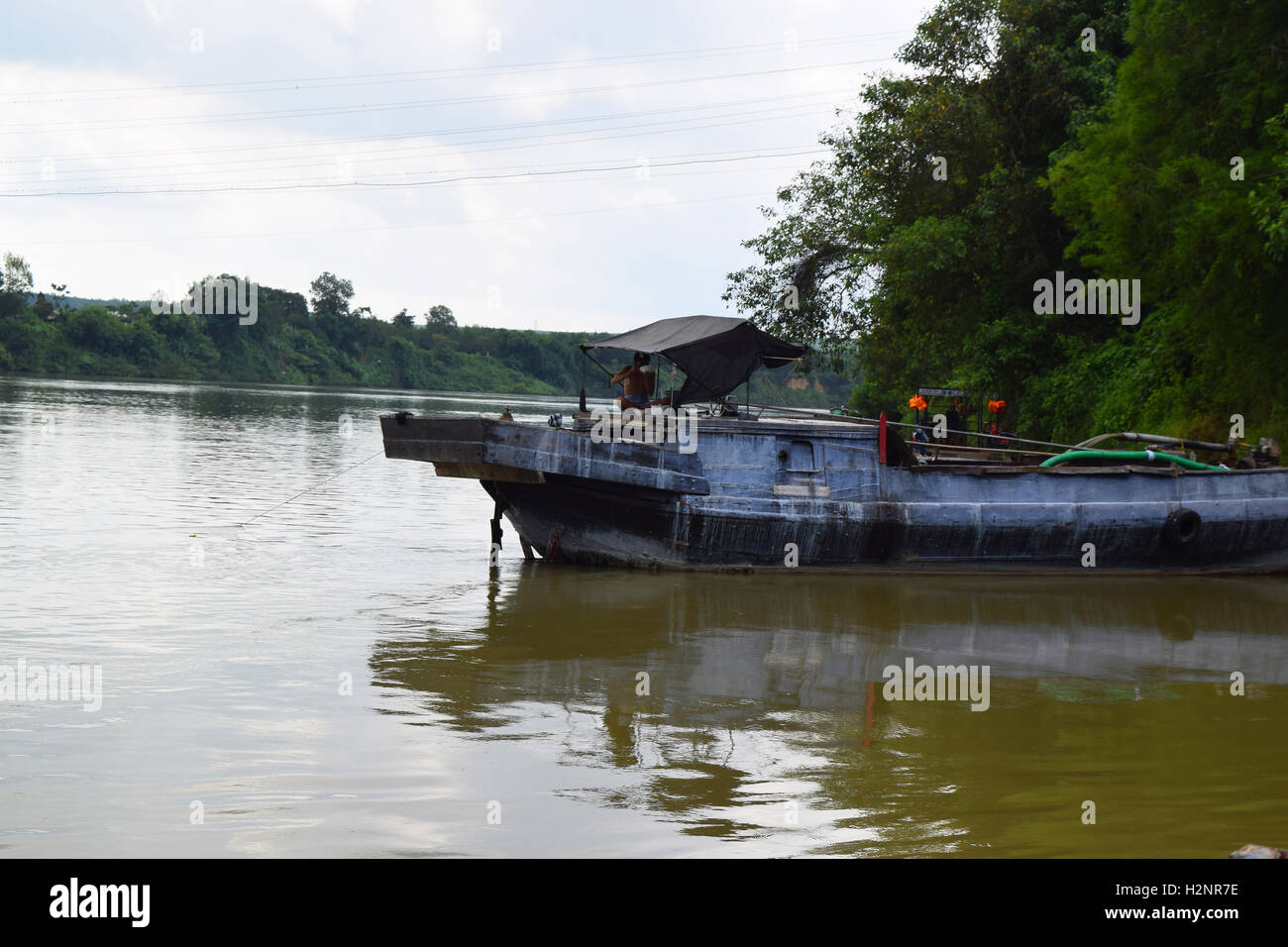 traditional asian fishing boat in river, vietnam Stock Photo - Alamy