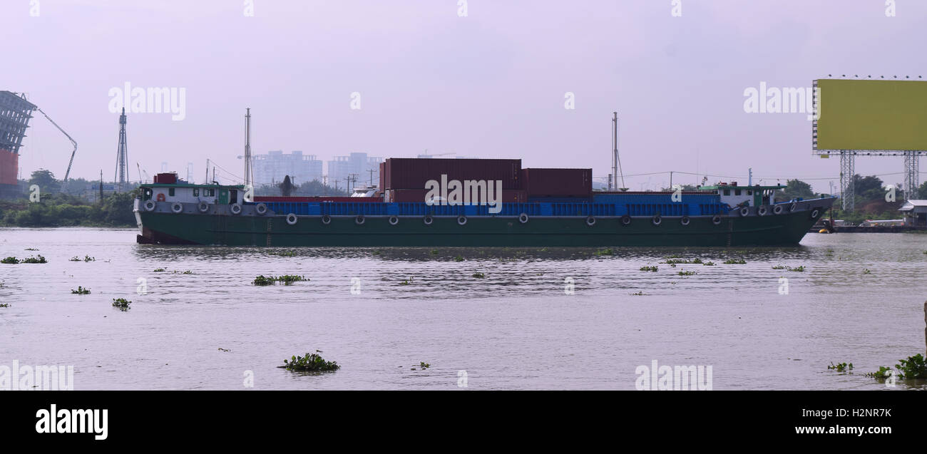 ship and container in river Stock Photo - Alamy