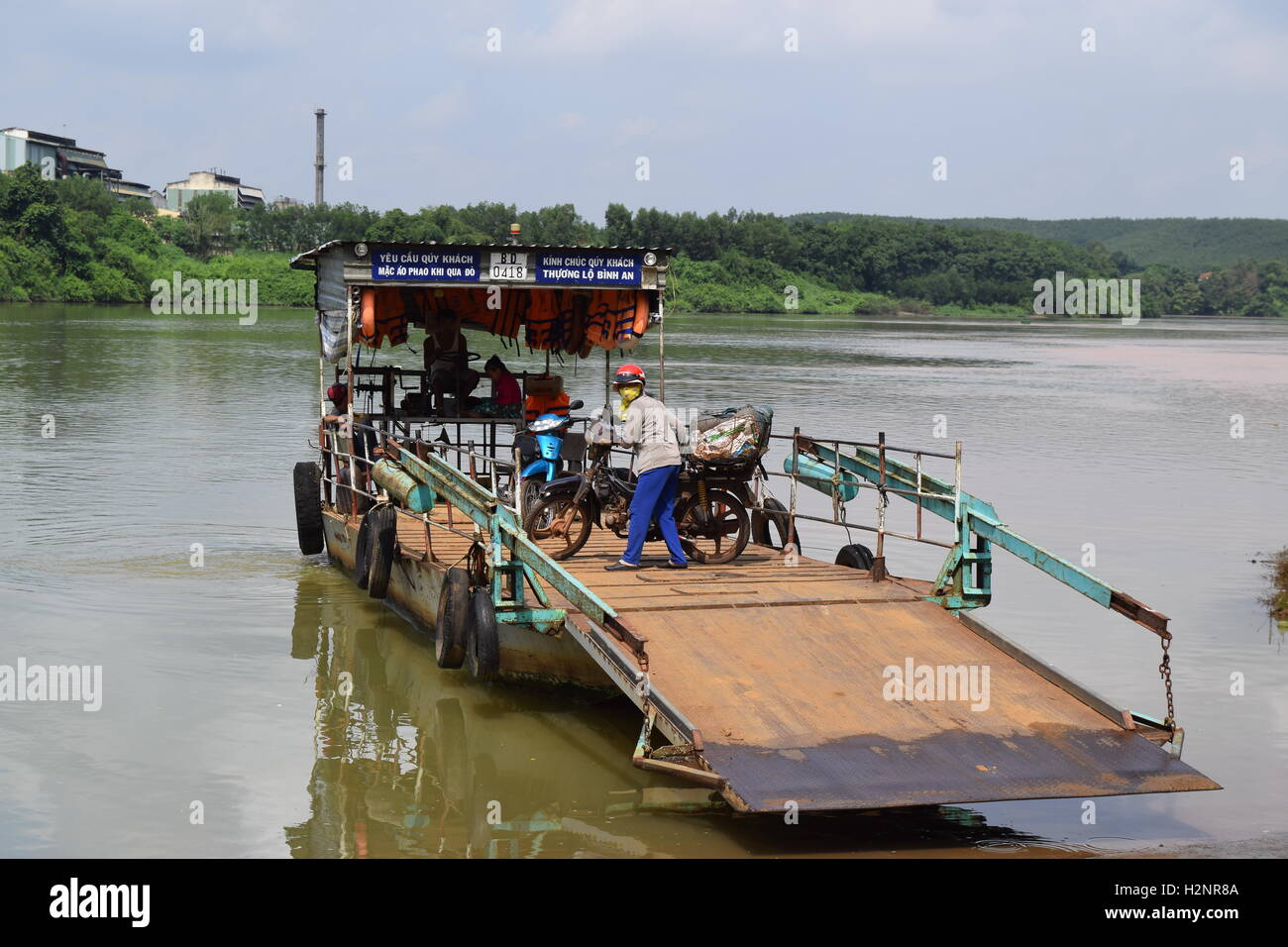 traditional asian passenger ferry in river, vietnam Stock Photo - Alamy