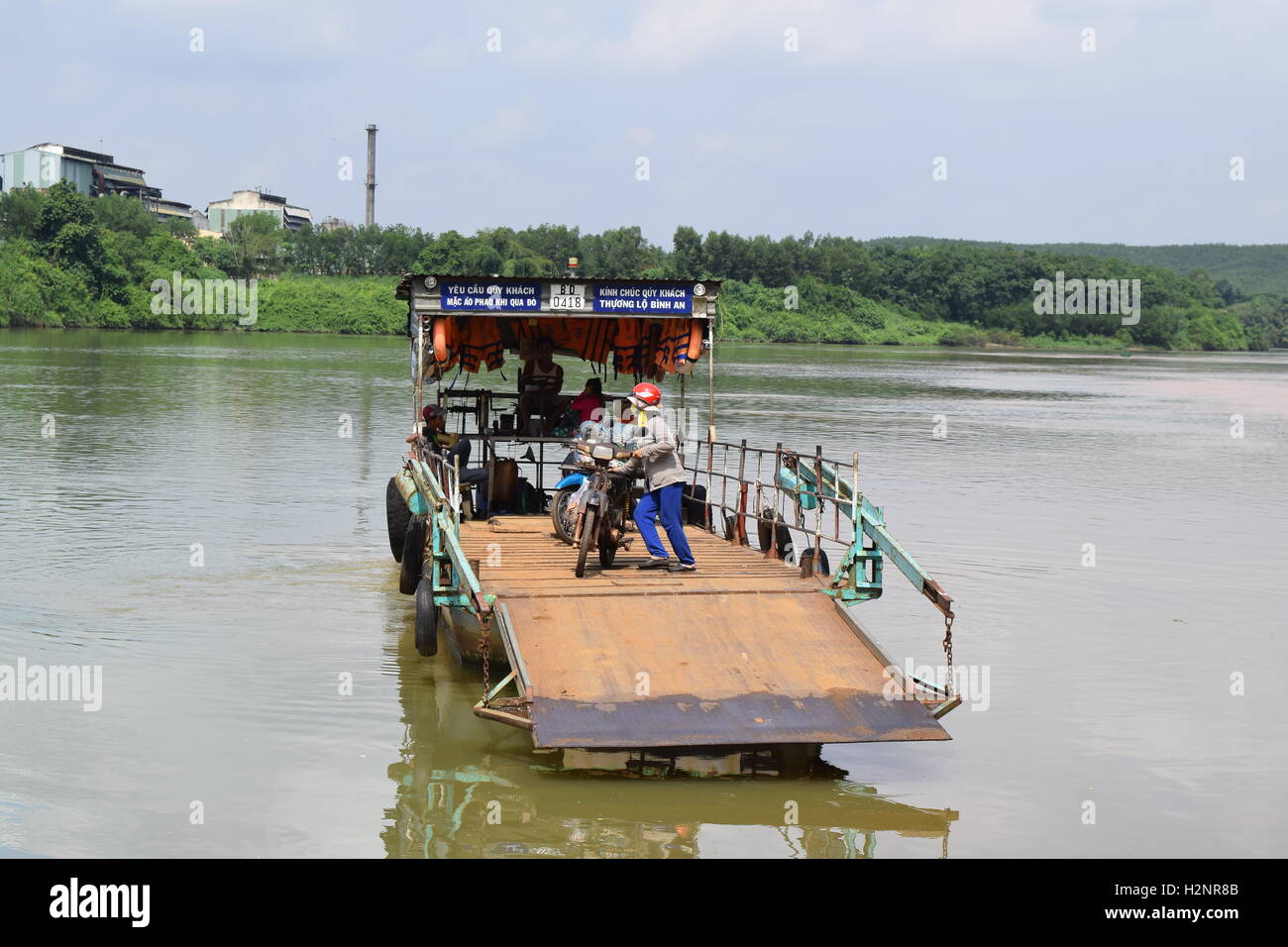 traditional asian passenger ferry in river, vietnam Stock Photo - Alamy