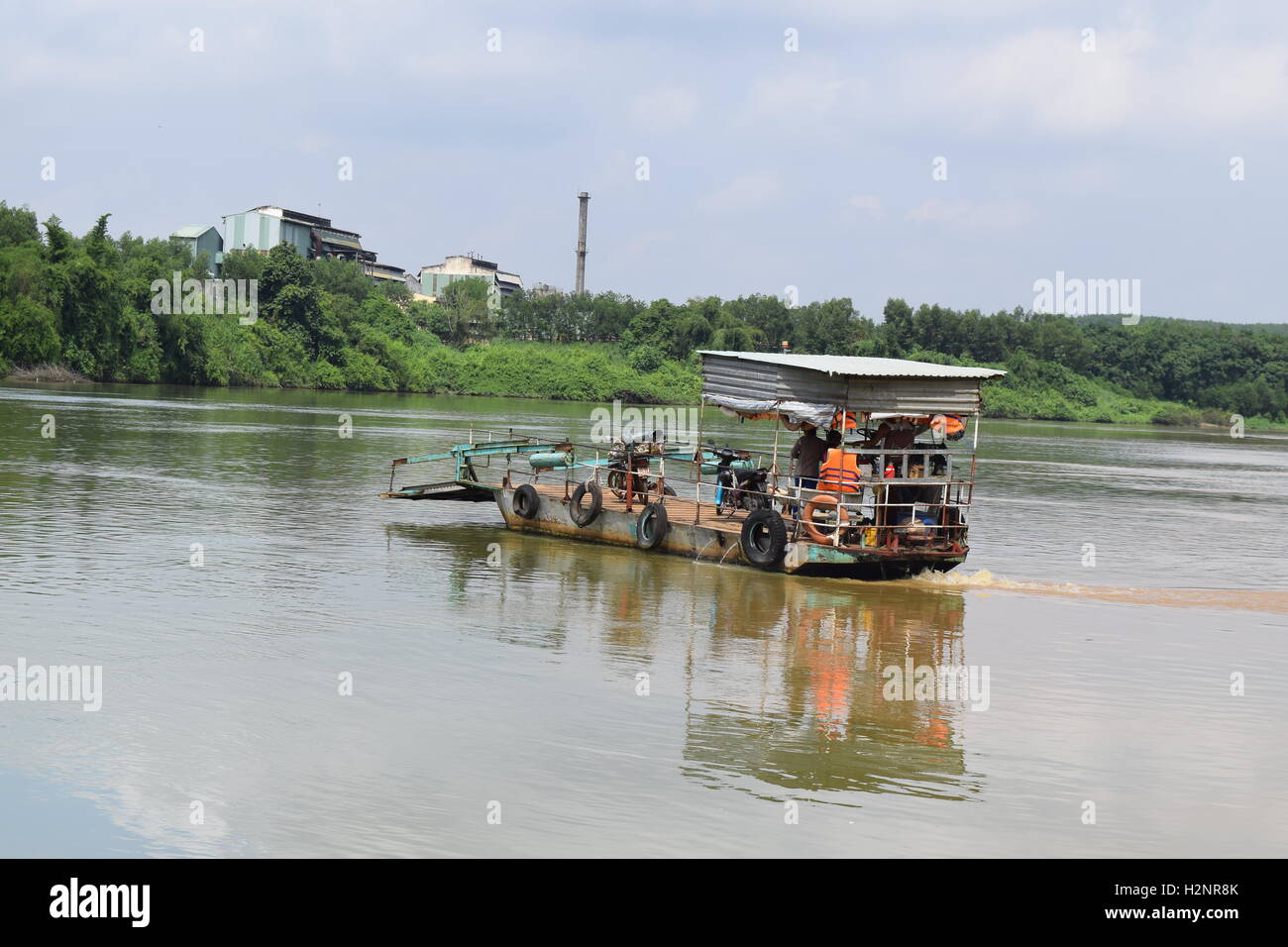 traditional asian passenger ferry in river, vietnam Stock Photo - Alamy