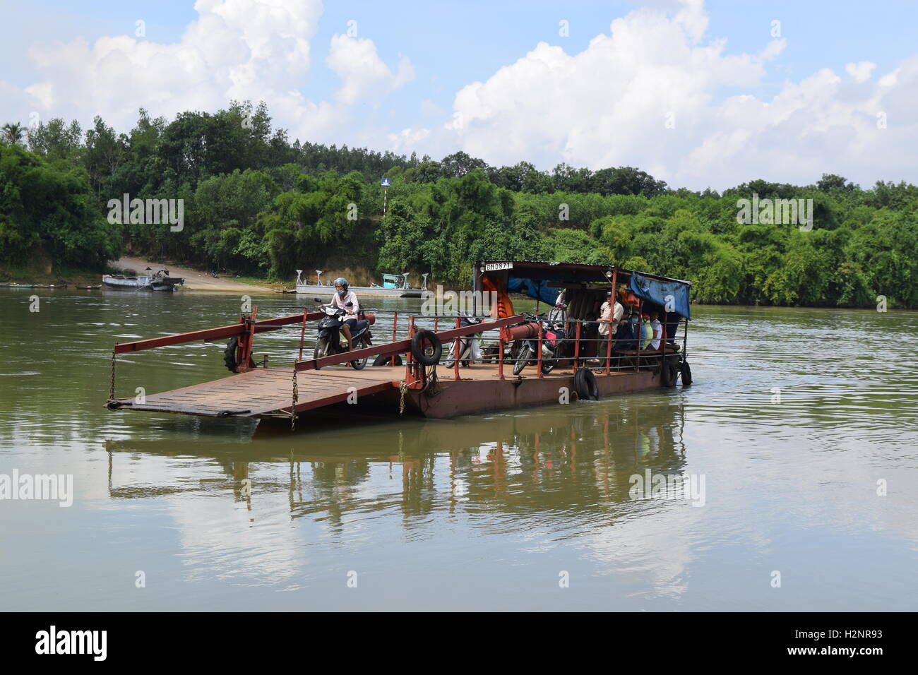 traditional asian passenger ferry in river, vietnam Stock Photo - Alamy
