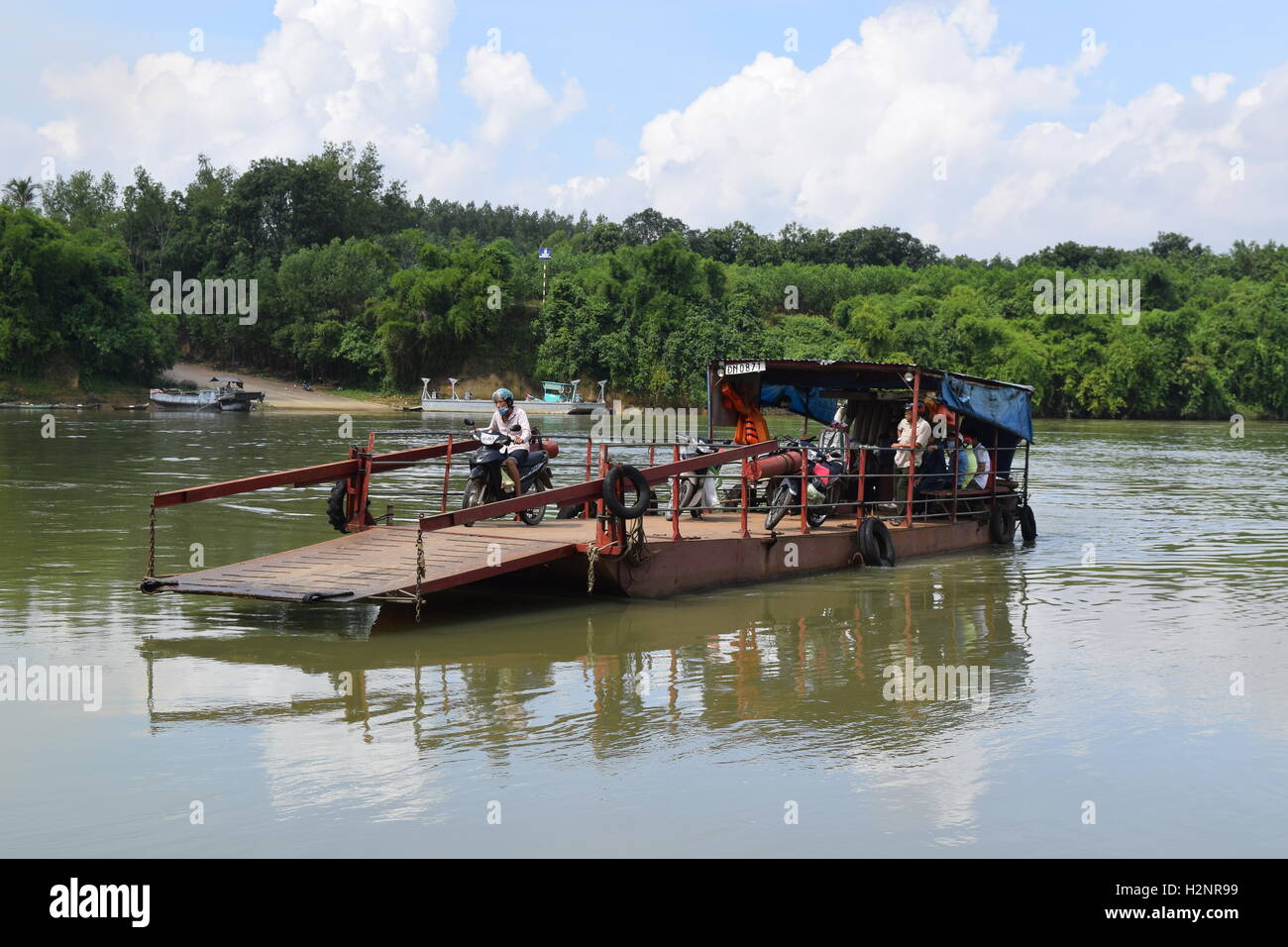 traditional asian passenger ferry in river, vietnam Stock Photo - Alamy