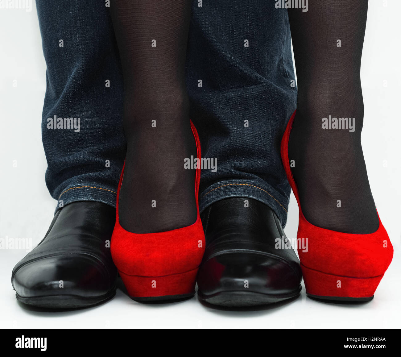 Two pairs of legs - male and female - on a light background Stock Photo ...