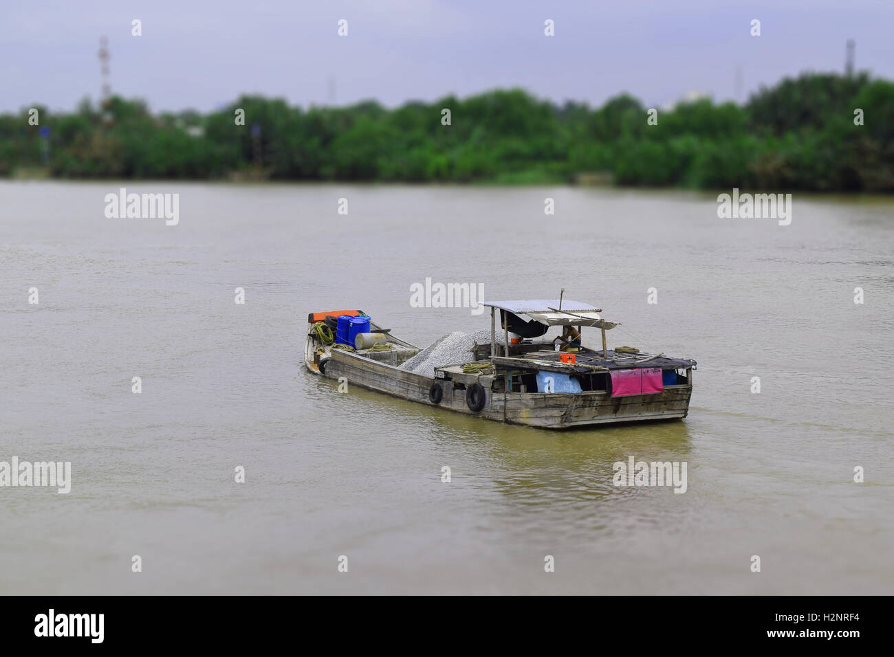 traditional asian fishing boat in river, vietnam Stock Photo - Alamy