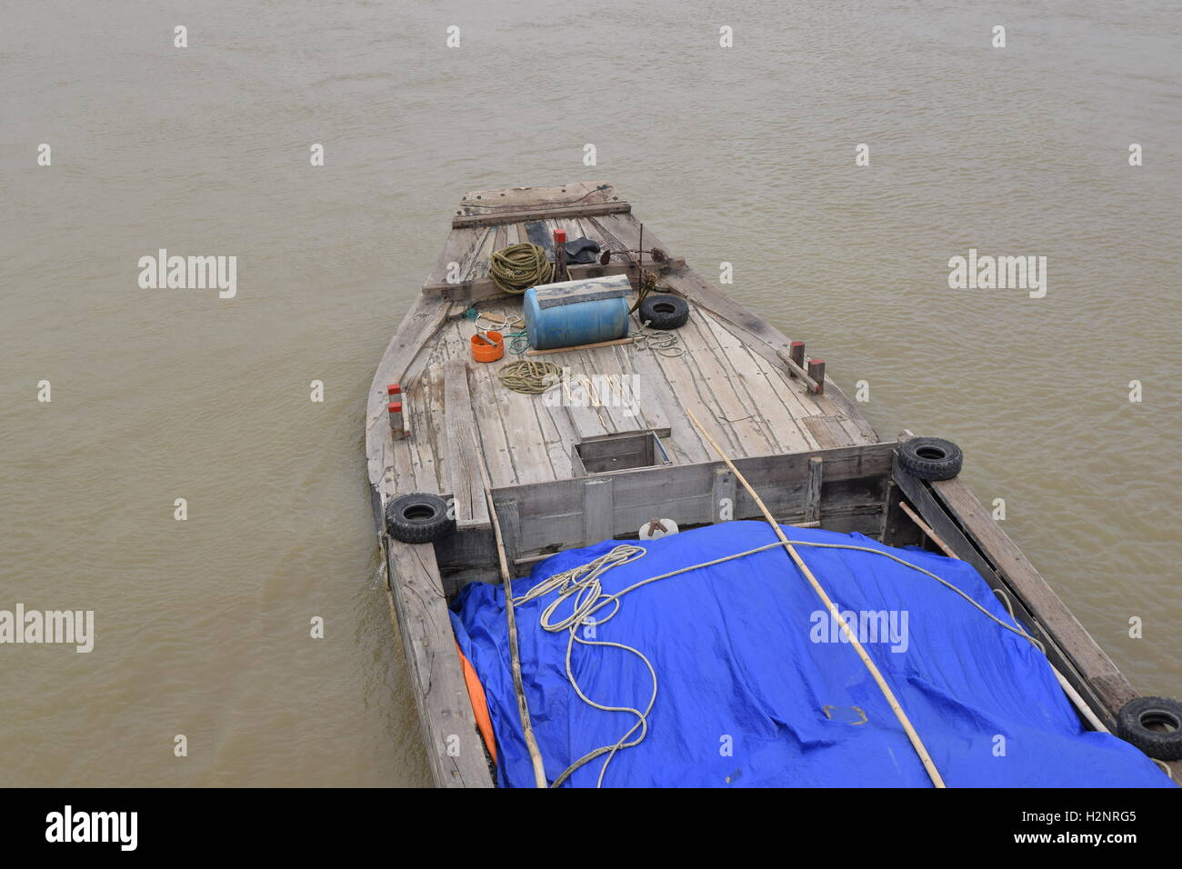 traditional asian fishing boat in river, vietnam Stock Photo - Alamy