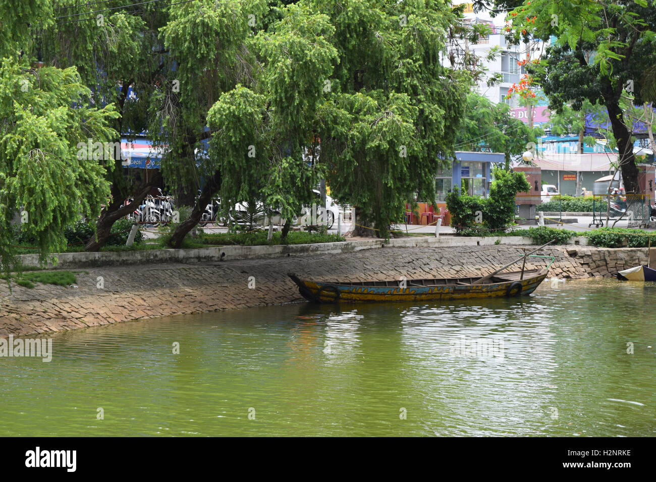 traditional asian fishing boat in river, vietnam Stock Photo - Alamy