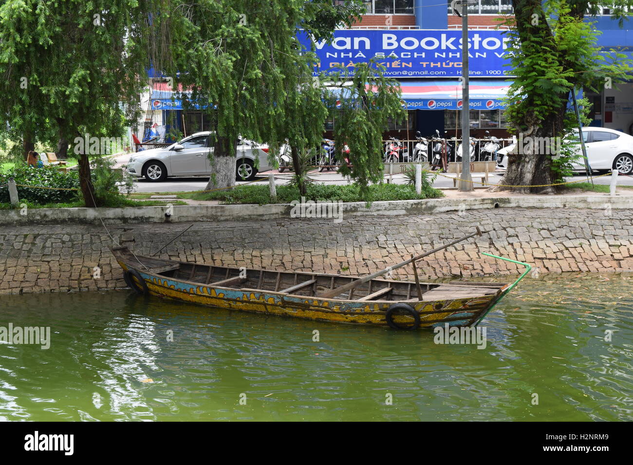 traditional asian fishing boat in river, vietnam Stock Photo - Alamy