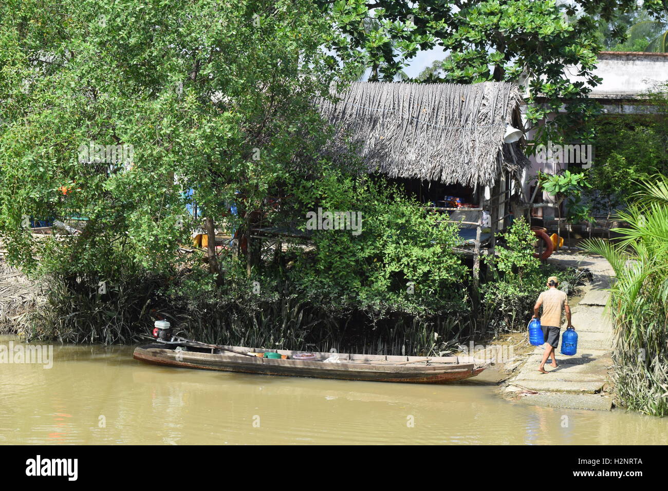 traditional asian fishing boat in river, vietnam Stock Photo - Alamy