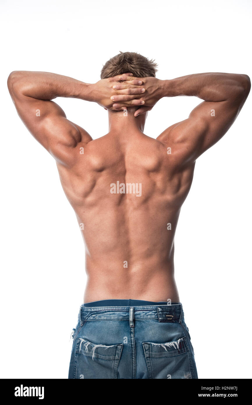 Bodybuilder, young man with muscular upper body Stock Photo - Alamy