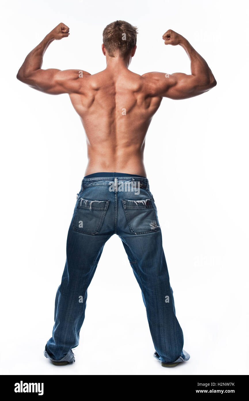 Bodybuilder, young man with muscular upper body Stock Photo - Alamy