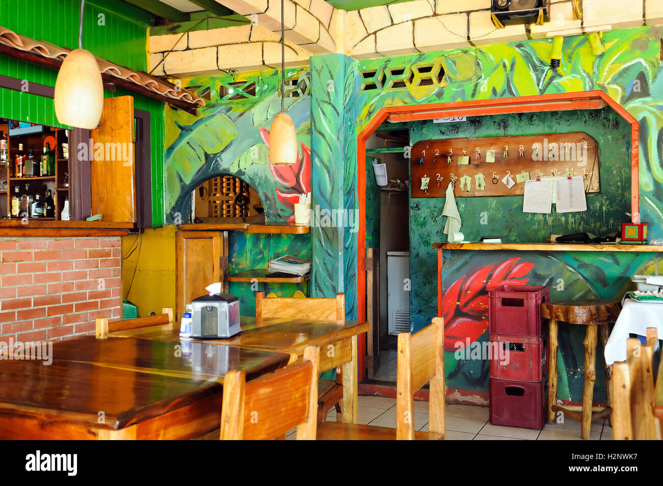 Reception desk in tropical hostel Stock Photo - Alamy