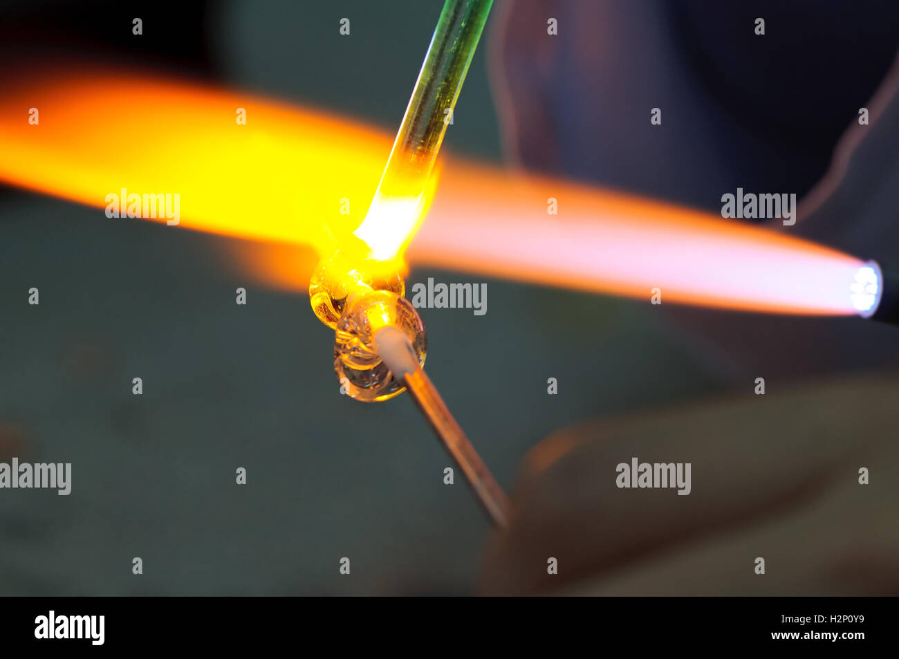 The art of shaping glass using fire Stock Photo - Alamy