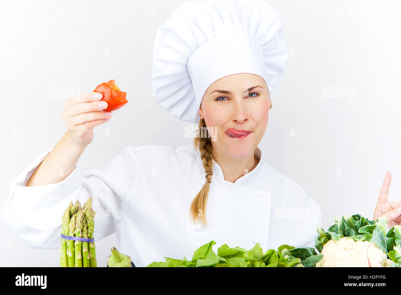 beautiful young chef woman prepare and decorating tasty food in kitchen ...