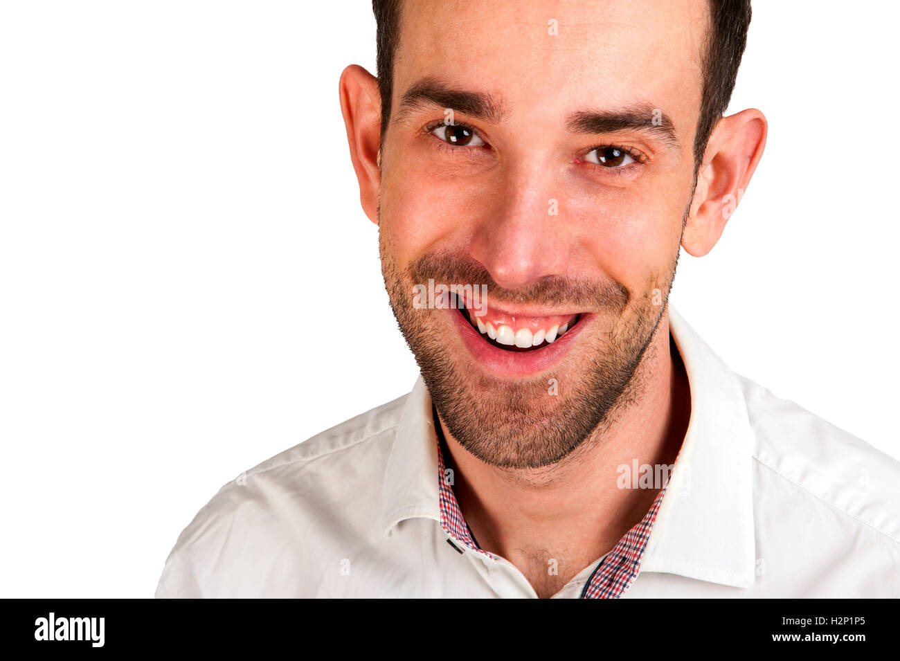 Portrait of a smart young man standing with white background Stock ...