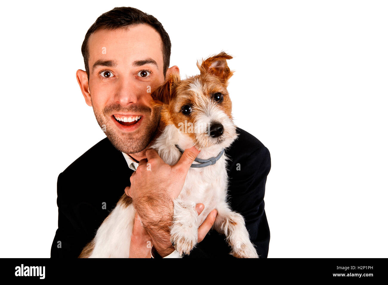 Man with dog smiling, isolated over white background Stock Photo - Alamy