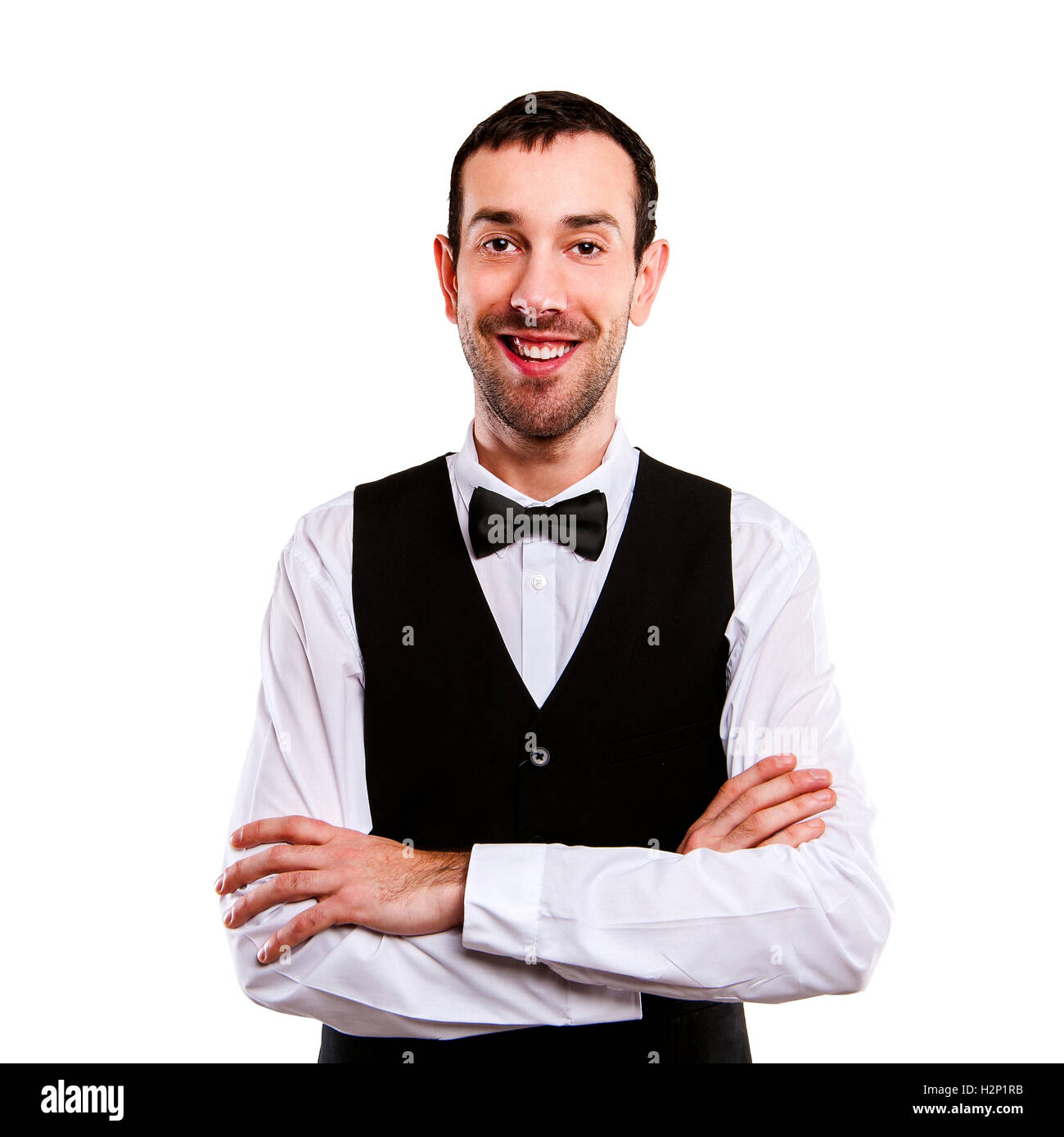 Waiter man isolated over white background with ars crossed, smiling ...
