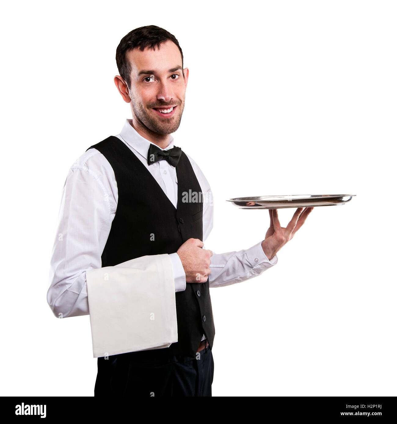 Waiter holding tray. Isolated over white background. Smiling butler ...