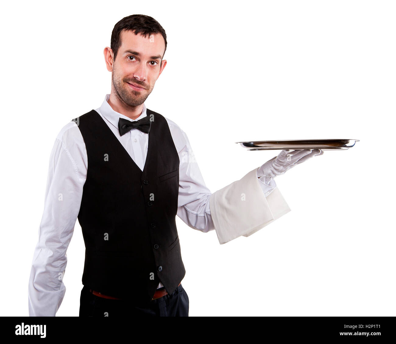 Waiter holding tray. Isolated over white background. Smiling butler ...