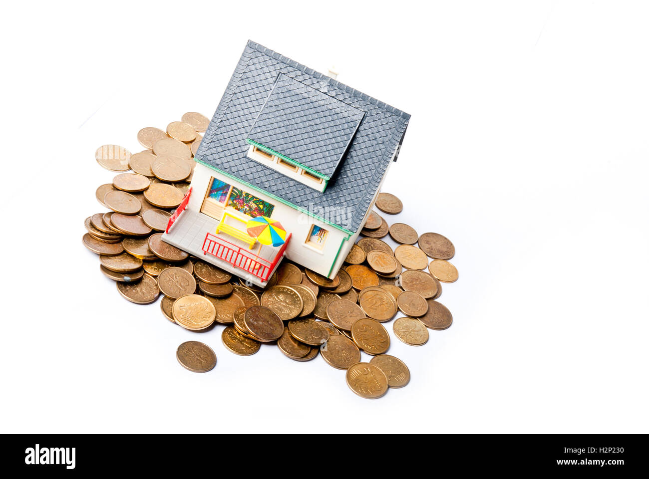 House on pile money Cut Out Stock Images & Pictures - Alamy