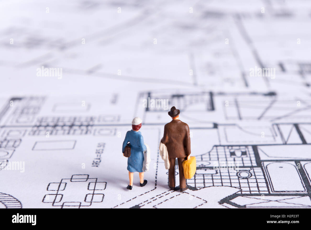 miniature people on plans Stock Photo - Alamy